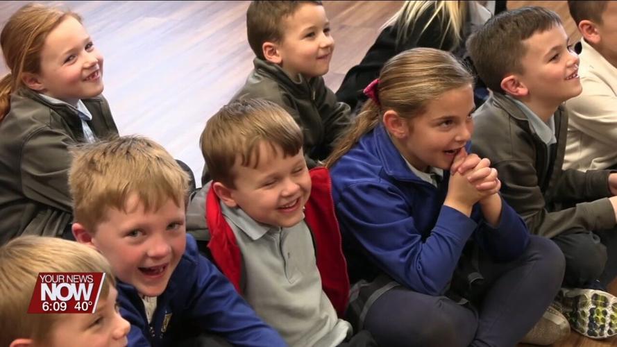 6th graders at Delphos St. John's teach kindergarteners Bible stories ...