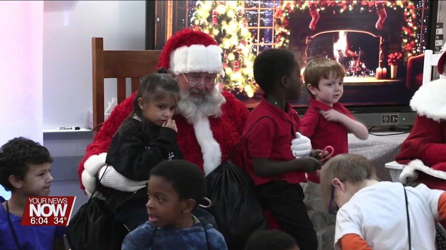 Santa and Mrs. Claus make a stop at Unity Elementary to pass out gifts ...