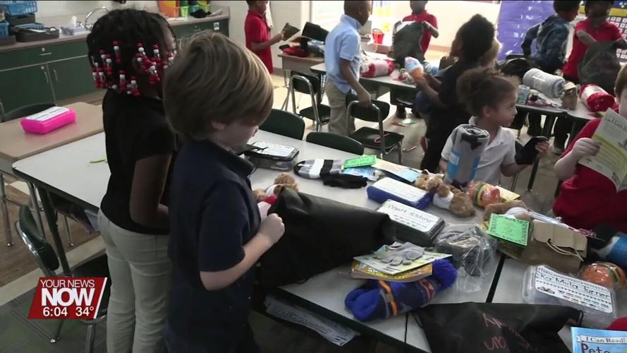 Santa and Mrs. Claus make a stop at Unity Elementary to pass out gifts ...