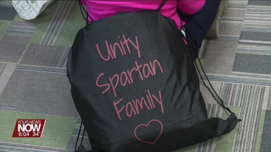 Santa and Mrs. Claus make a stop at Unity Elementary to pass out gifts to excited students ...