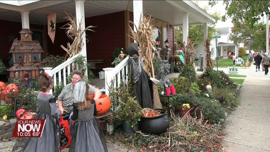 Community members decorate, dress up, and hand out candy to give kids ...