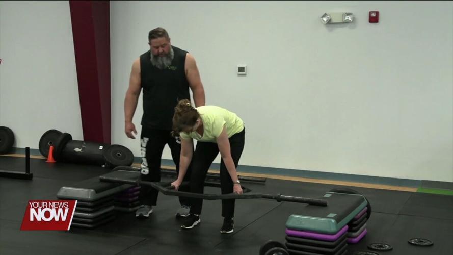 Strongman competitor and world record holder begins a workout class for ...