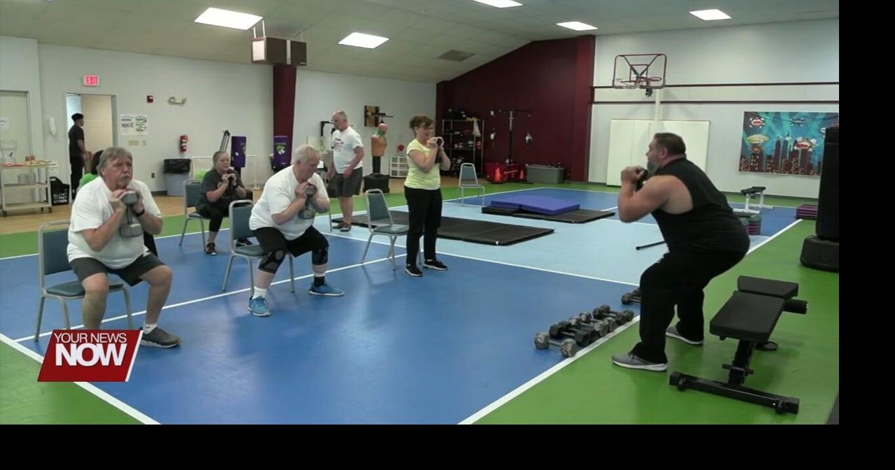 Strongman competitor and world record holder begins a workout class for ...