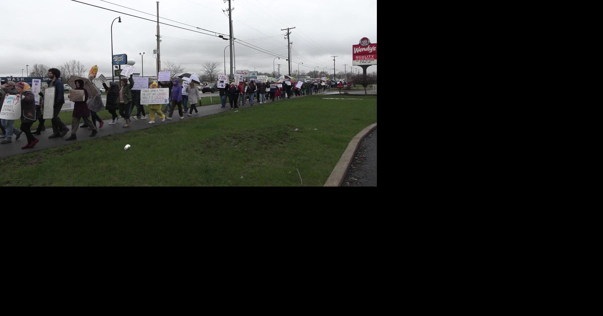Democrats march through rain in Bluffton protest | Allen County ...