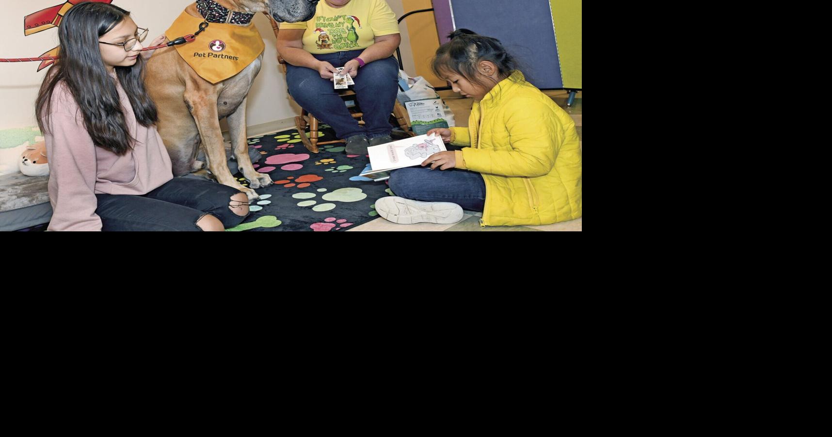 Therapy dog visits students in library reading program | News | hpenews.com