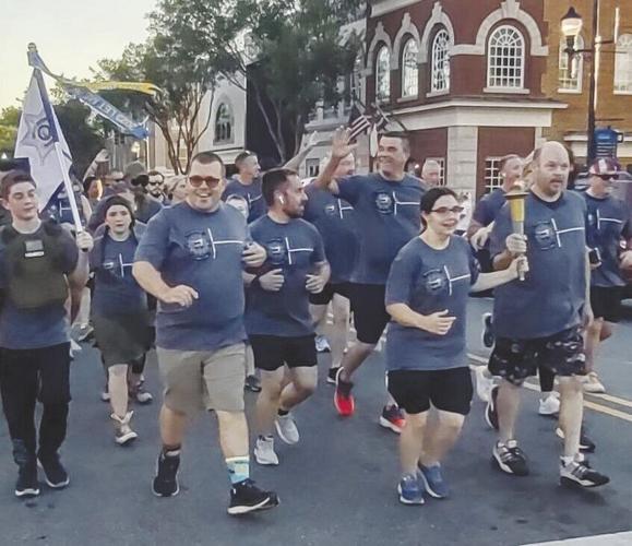 Local law enforcement hold torch run in support of NC Special Olympics ...