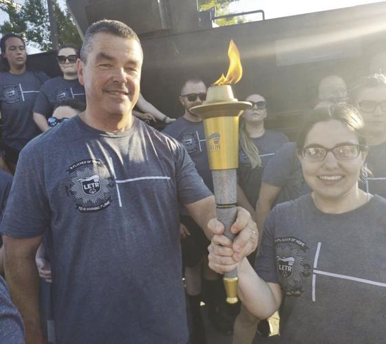 Local law enforcement hold torch run in support of NC Special Olympics ...