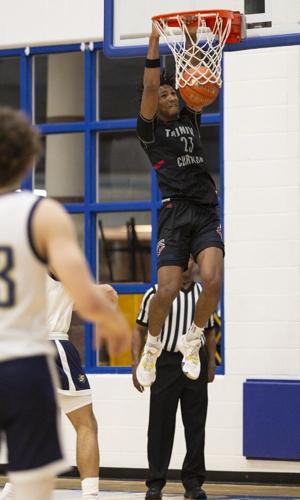 BOYS BASKETBALL | Mission accomplished this time: Lions stave off St ...