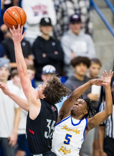 BOYS BASKETBALL | Relentless Tigers fight and survive a double-OT ...