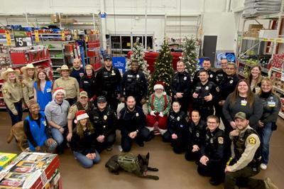 Shop With a Cop helps students pay for Christmas gifts | Local News ...