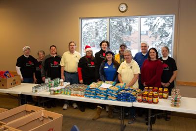 Lions Club help feed 20 families at Christmas | Local News ...