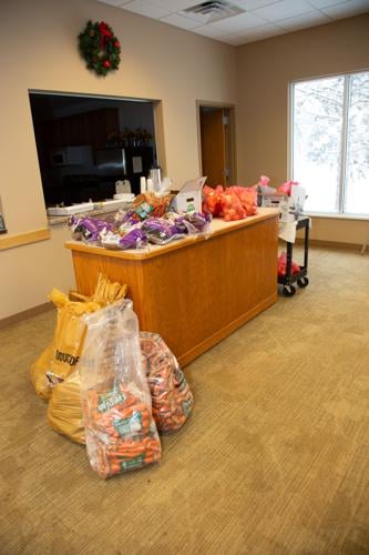 Lions Club help feed 20 families at Christmas | Local News ...