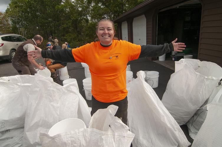 Volunteers join scouts for a day of service on the prairie | Local News ...