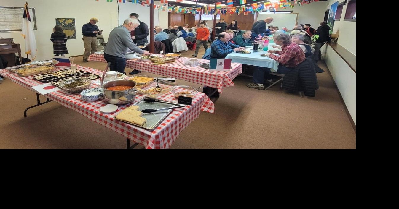 International feast, fellowship draws 60 people | Community ...