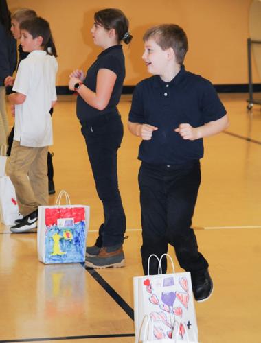 SPPS students serve community’s elderly; make gifts as part of Catholic ...