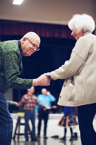 Beginners take their turns at square dancing; Do-Si-Do with the ...