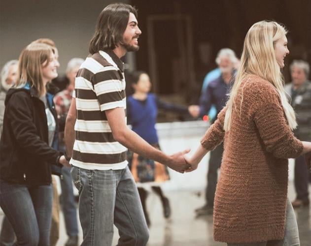 Beginners take their turns at square dancing; Do-Si-Do with the ...