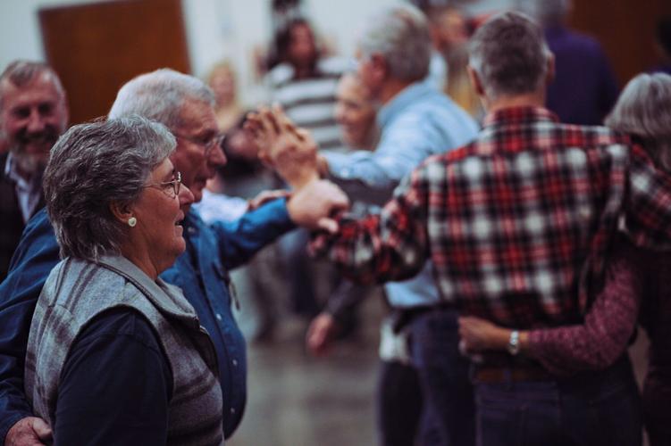 Beginners take their turns at square dancing; Do-Si-Do with the ...