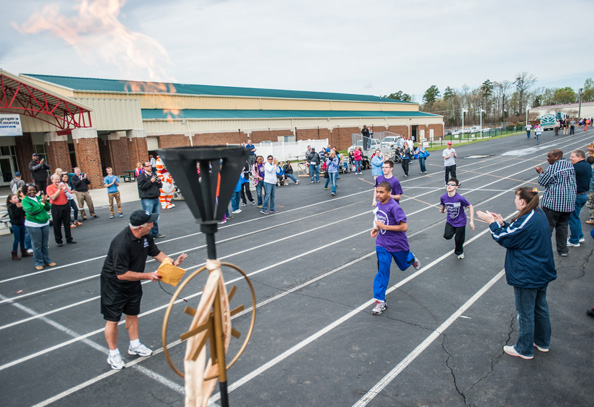 Special Olympics winners running for fun, medals