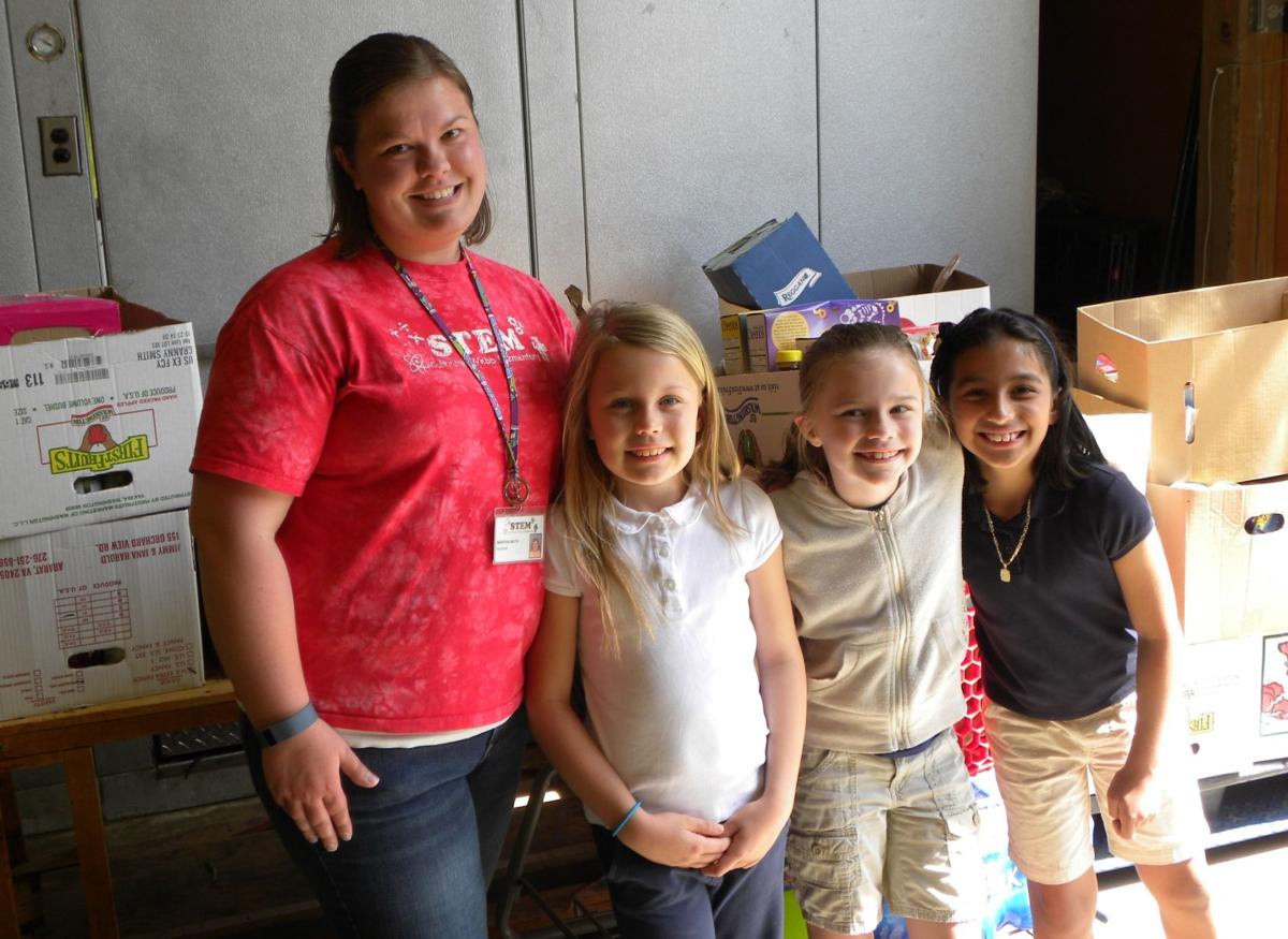 Coltrane-Webb students pitch in to help hungry at CCM