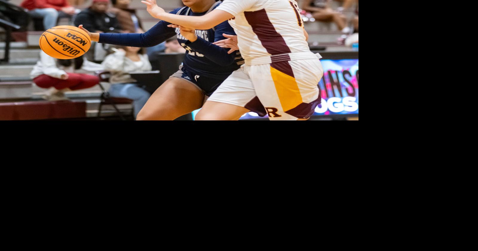 PHOTOS - Hickory Ridge battles Jay M. Robinson in girls basketball