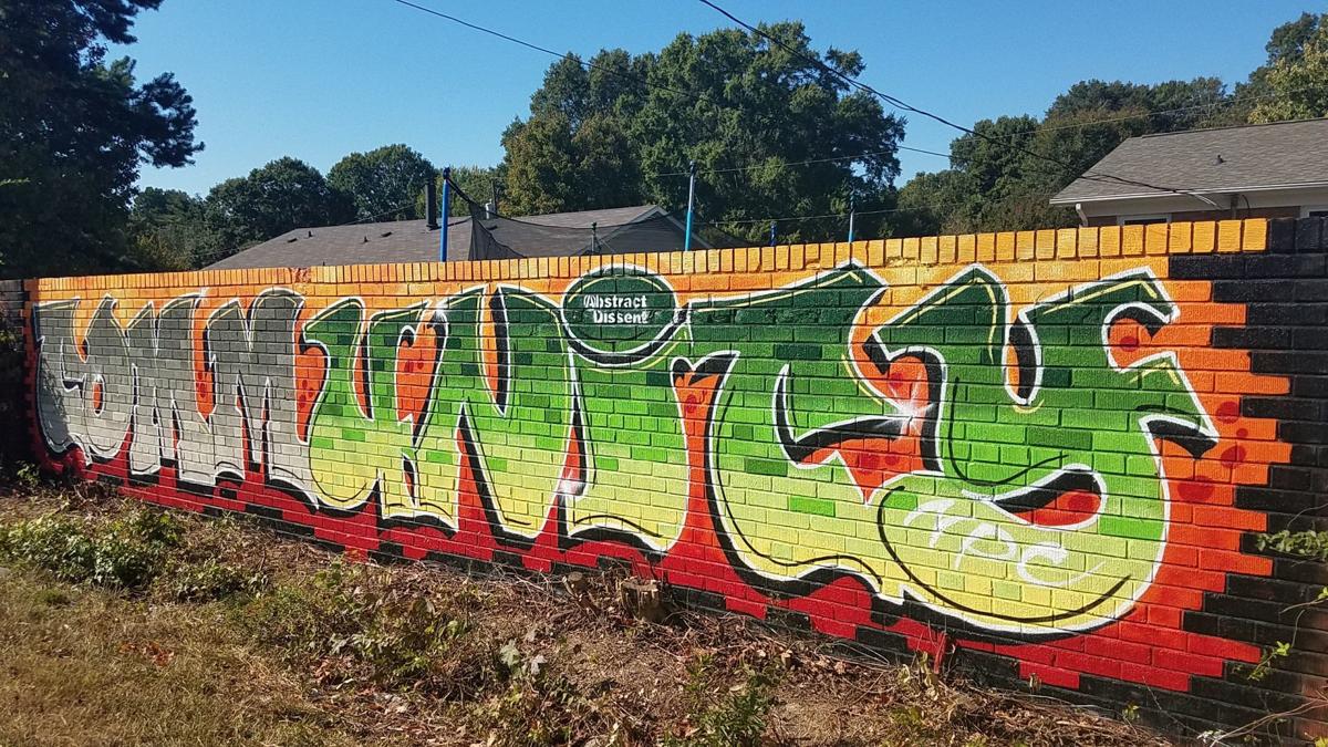 Local street artist turns Kannapolis 'segregation wall' into unifying ...