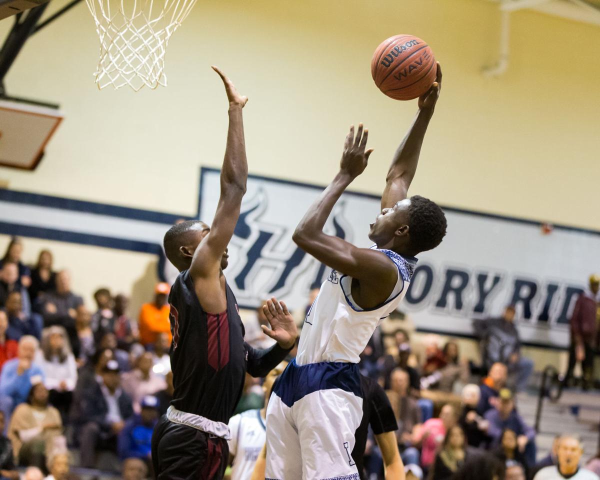 BOYS BASKETBALL: Hickory Ridge holds off Jay M. Robinson, thanks to ...