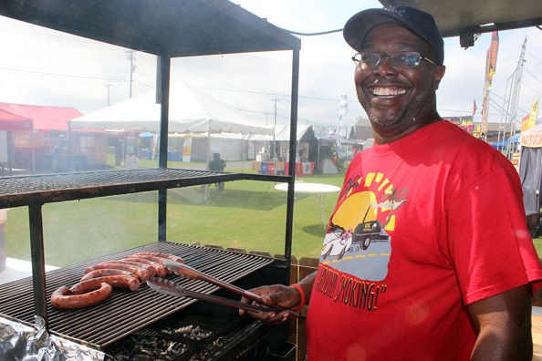 Barbecue, with a side of circus, cooking near speedway