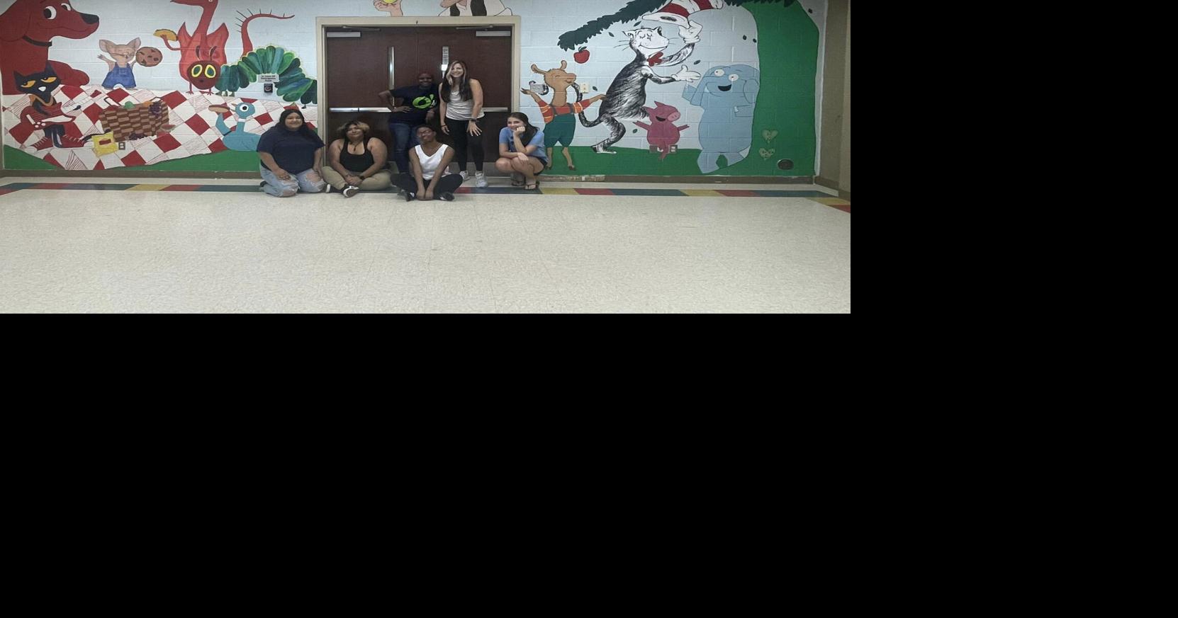 Students paint storybook mural at the Y
