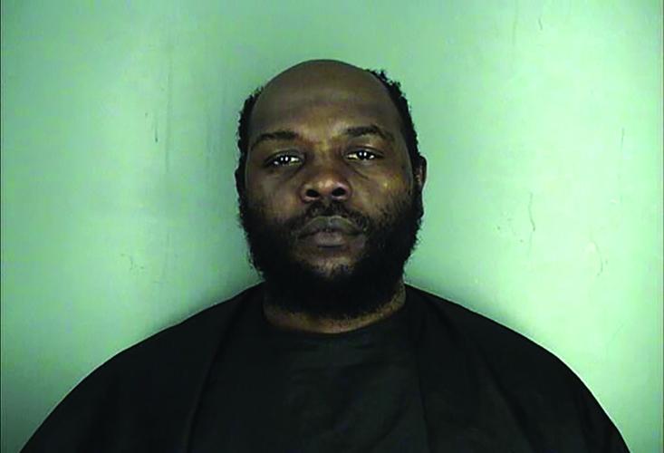 Greenwood burglary suspect found hiding behind house | News ...