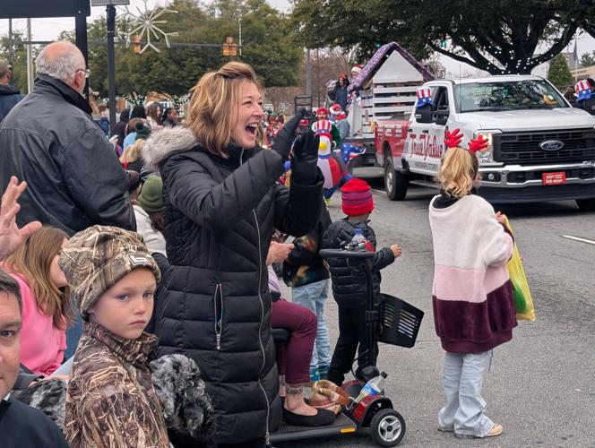 Cold wind, warm hearts: Greenwood’s Christmas Parade fills Main Street ...