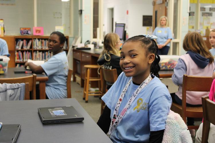Hodges Elementary students, staff wear matching Ava's Army shirts ...