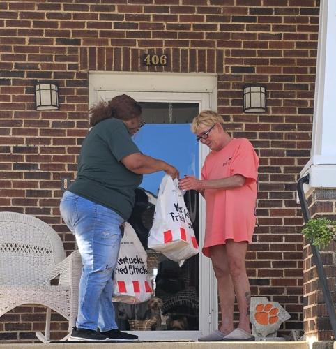 The power of two: Bringing relief and building community asign Mathews ...