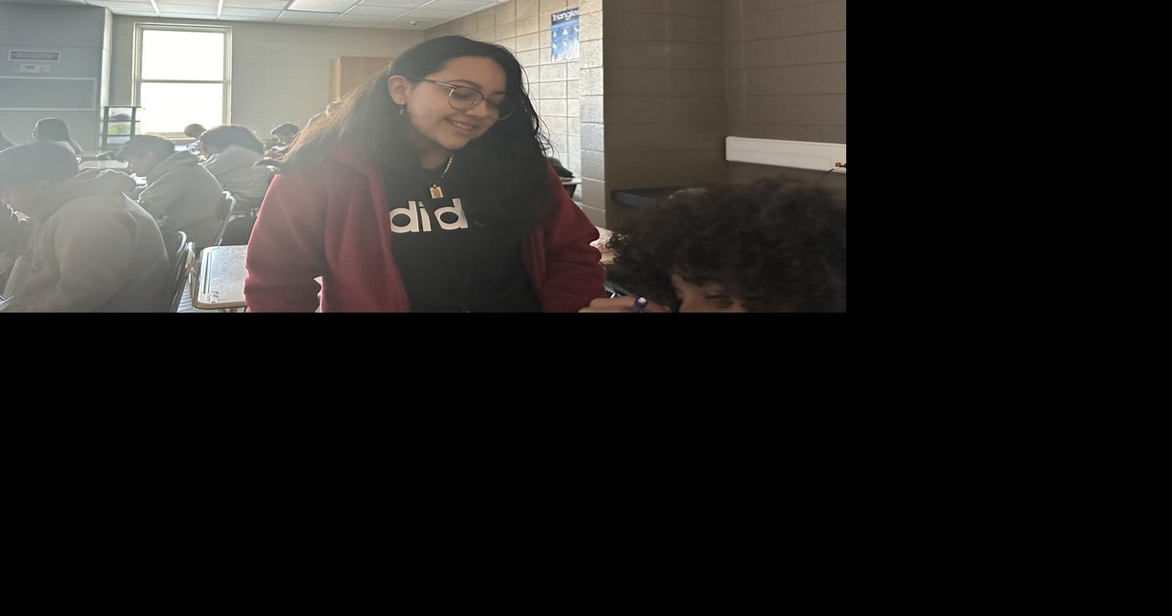 Student interpreter helps bridge language barrier in math class | News ...