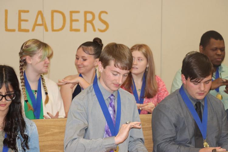 District 52 reviews budget, recognizes marching band victory | News ...