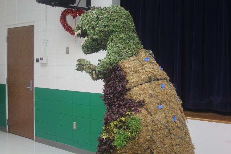 PHOTOS: Rice Elementary students assist in building T-Rex topiary ...