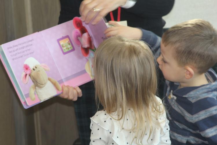 Look at books: Greenwood library, eatery unite to promote reading to ...