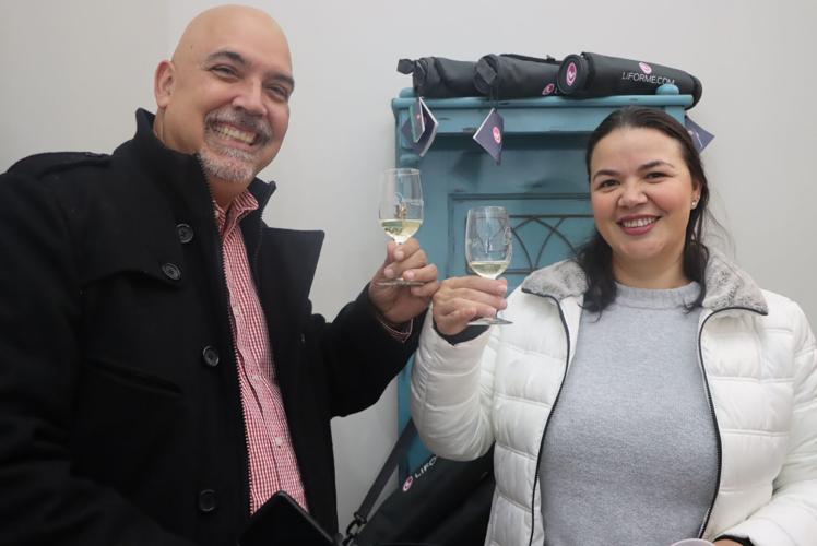 Wine walk kicks off Holiday shopping season in Uptown | News ...