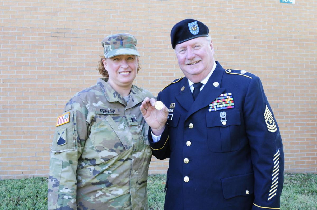 Shannon passes the coin | Lakelands Connector | indexjournal.com