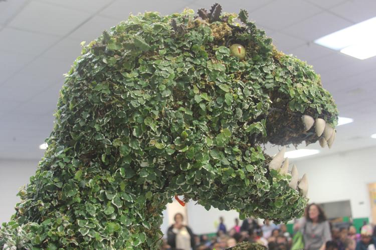 'Dino Dude': Rice Elementary students assist in building T-Rex topiary ...