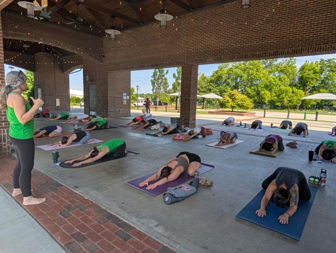 Bare feet, deep breaths and poses mark Greenwood’s International Yoga ...