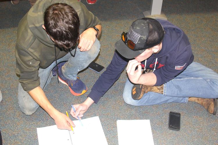 No worries: Robotics team members brainstorm for solutions | News ...