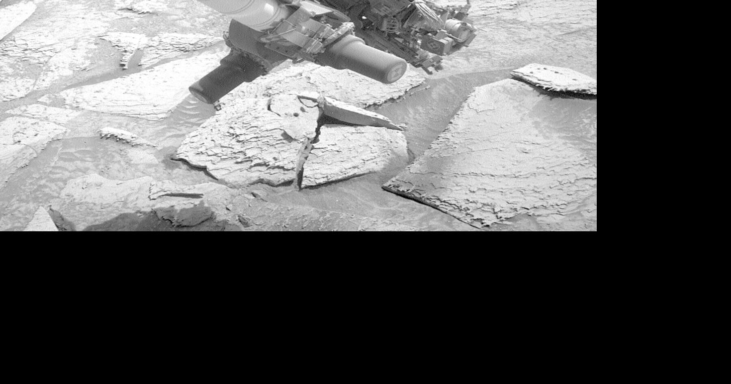 Clingy Martian boulder sticks with Curiosity rover for week | National ...