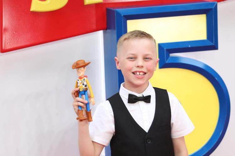 Boy from viral ‘Toy Story’ photo invited to ‘Toy Story 5’ premiere ...