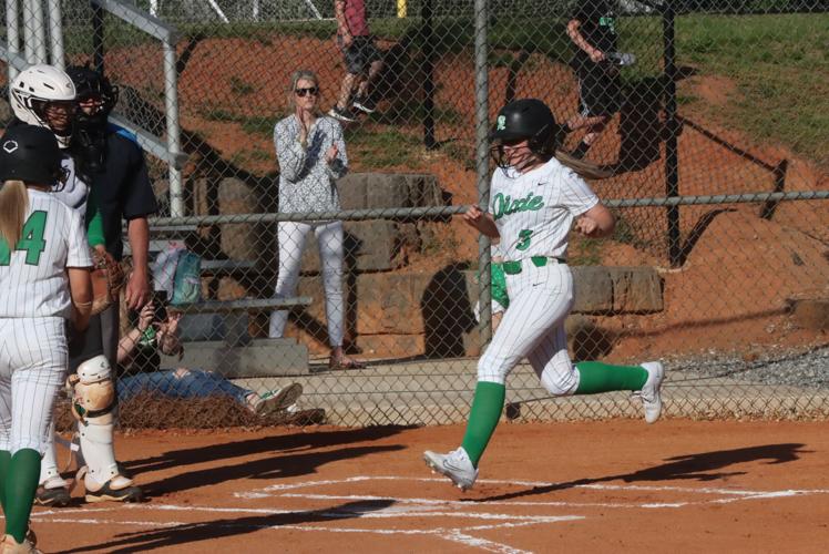 Dixie softball takes care of business in two innings in playoff win ...