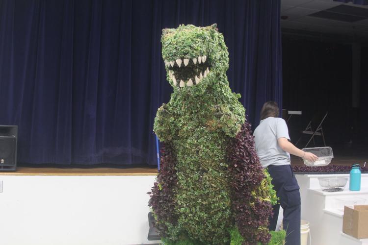 PHOTOS: Rice Elementary students assist in building T-Rex topiary ...