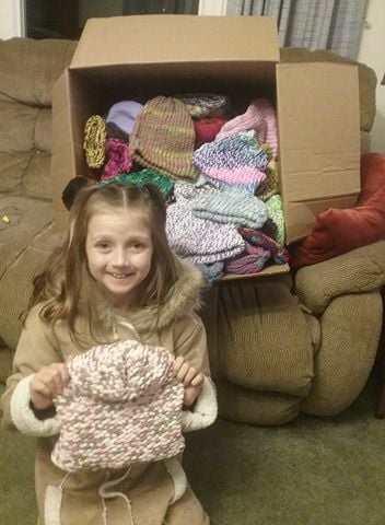 Young cancer survivor spearheads collection of knit hats for patients ...