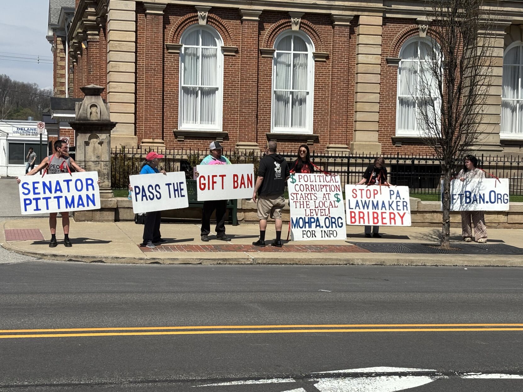 Bull riding, gift ban proposal are topics for protest outside Pittman's ...