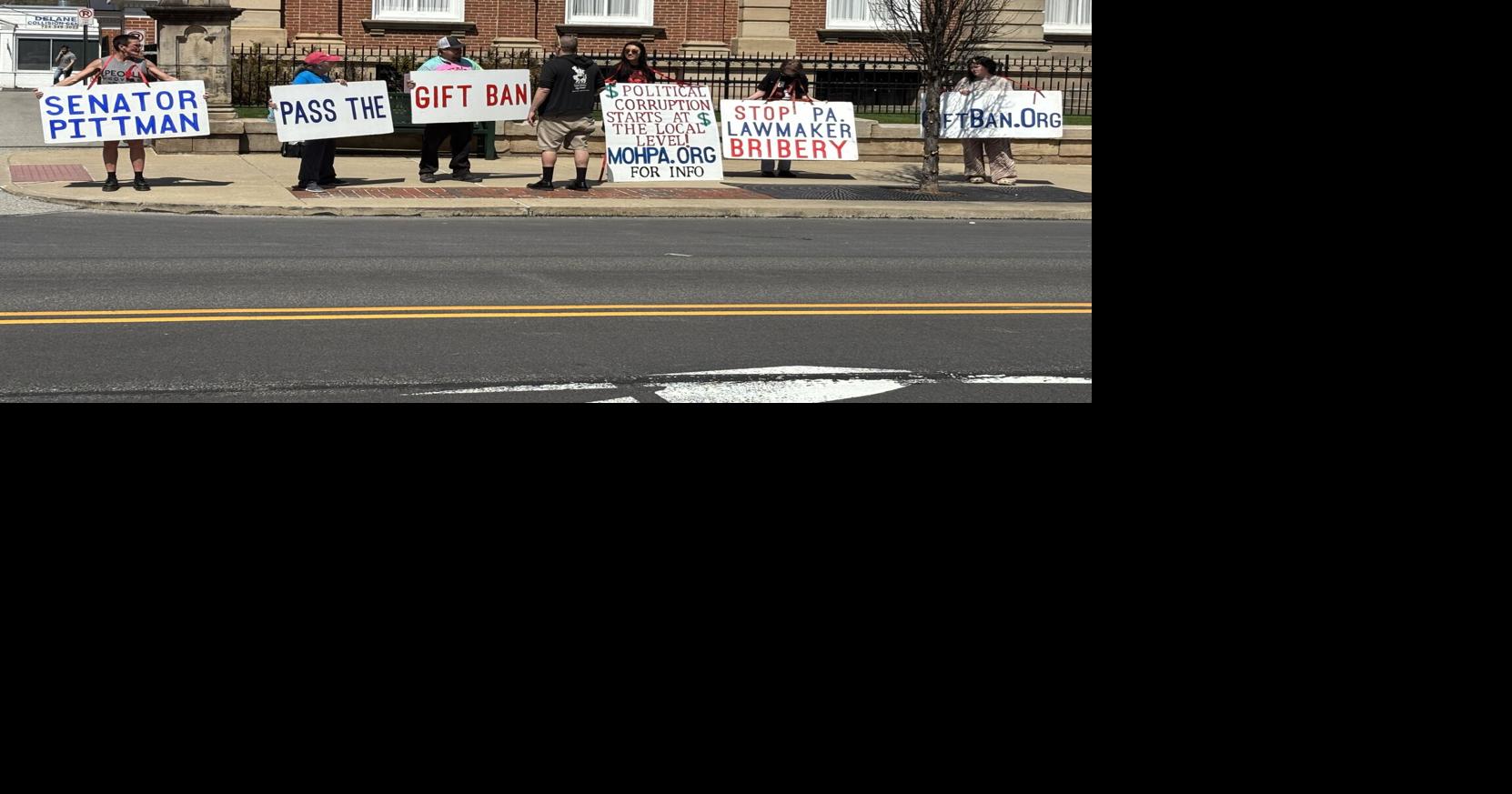Bull riding, gift ban proposal are topics for protest outside Pittman's ...