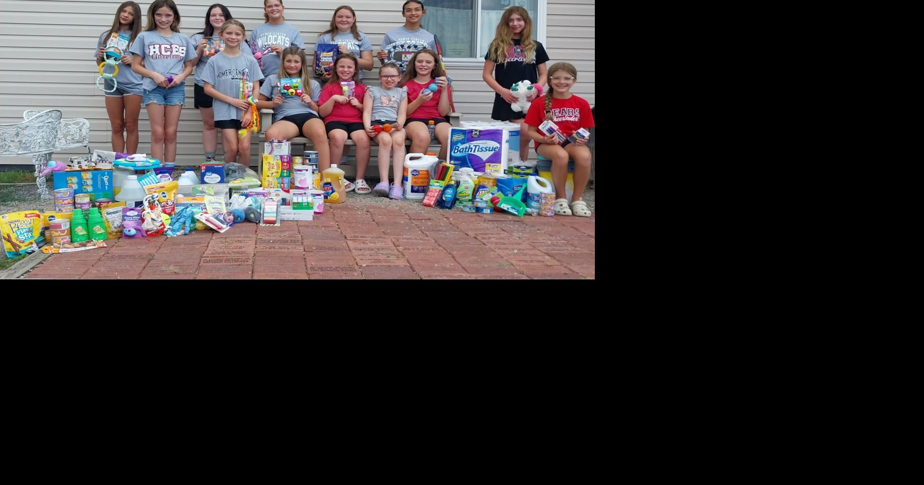 Cheerleaders complete first community service project | Community News ...